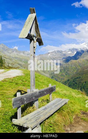 Wooden bench in autumn scenery Stock Photo - Alamy