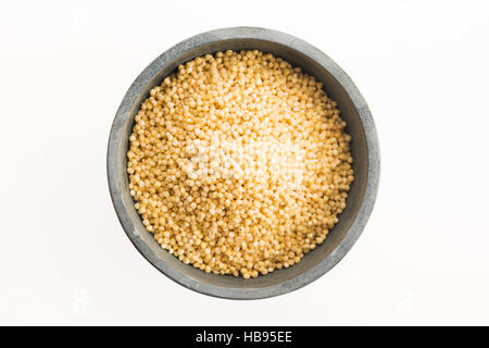 Millet groats isolated on white background Stock Photo - Alamy