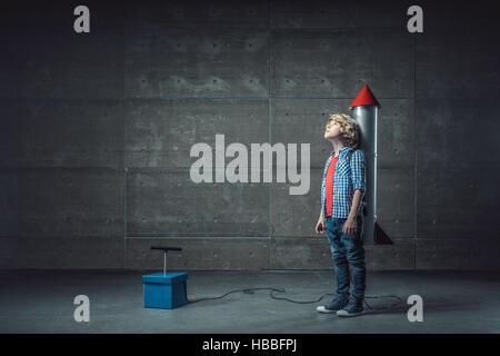 Boy with rocket Stock Photo - Alamy