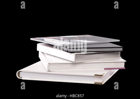 stack different sizes books isolated on white background Stock Photo ...