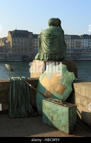 A photograph of the Helvetia statue on the Rhine river in Basel ...