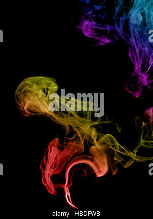Abstract multicolored smoke on a dark background Stock Photo - Alamy