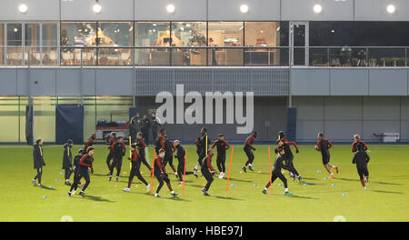 Manchester City players perform drills during a training session at the ...