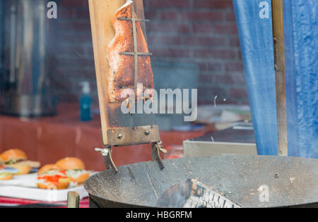 Grilling and smoking salmon on an open fire Salmon cooking and smoking ...