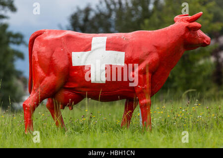 Red dairy cow with Swiss cross Stock Photo - Alamy