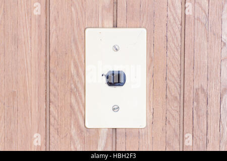 Japanese retro electrical switch on the wooden wall as the swtich set ...