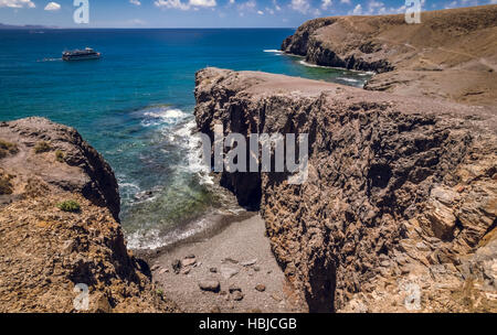 An aerial view of rocky cliffs in a water Stock Photo - Alamy