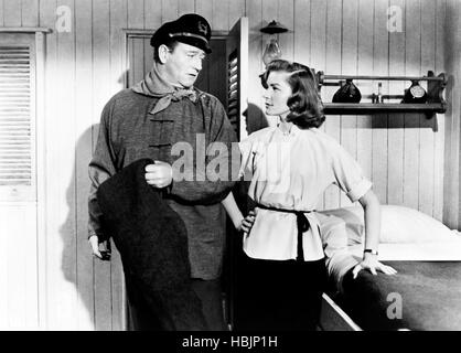 BLOOD ALLEY, from left: John Wayne, Lauren Bacall, 1955 Stock Photo - Alamy