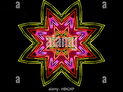 Image of pink and yellow neon star pattern moving in hypnotic motion on ...