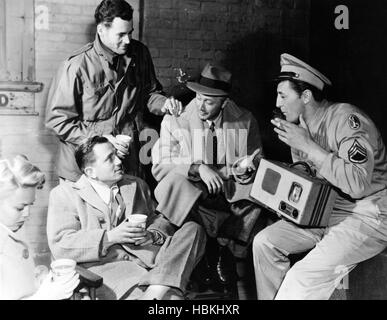 CROSSFIRE, from left: Robert Mitchum, Robert Young, 1947 Stock Photo ...
