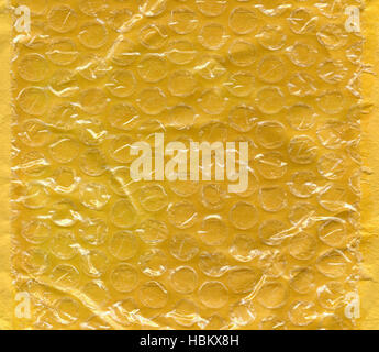 Yellow bubble wrap texture background Stock Photo - Alamy