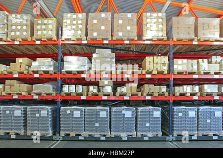 Distribution warehouse with mobile shelving system Stock Photo - Alamy