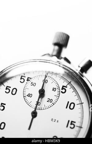 Mechanical stopwatch white background closeup Stock Photo - Alamy