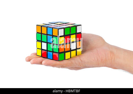 Concept of mathematics. Cube in hand surrounded by mathematical ...