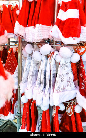 Christmas Santa Claus red hats on white Stock Photo - Alamy