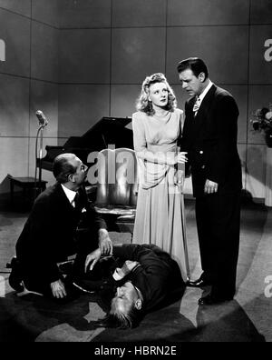 THE FROZEN GHOST, from left, Evelyn Ankers, Milburn Stone, Lon Chaney ...