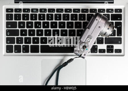 Professional digital camera and computer keyboard Stock Photo - Alamy