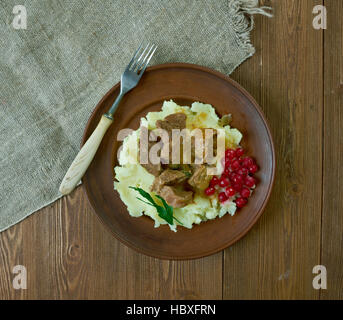 Sauteed reindeer venison steak served with mashed potatoes and ...