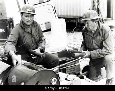 HELLFIGHTERS, from left: John Wayne, Jim Hutton (hard hat), Edmund ...
