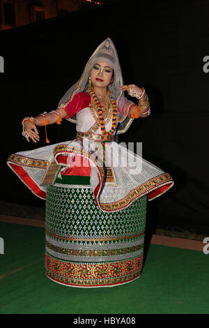 Manipuri dancer performing Manipur Rass dance on stage . Ajmer ...