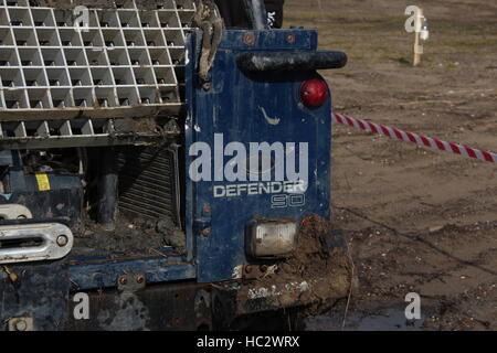 Rear view of a Land Rover defender driving off road in the UK Stock ...