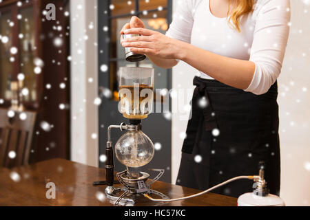 close up of woman with siphon coffee maker and pot Stock Photo - Alamy