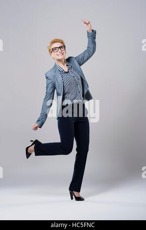 With legs raised high, a young woman with anorexia dedicates her time ...