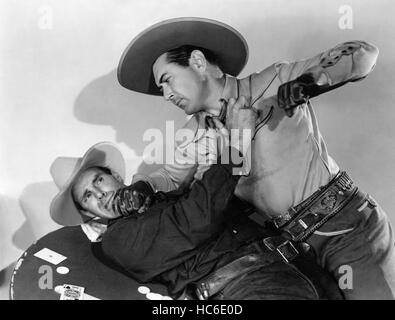 STAGECOACH BUCKAROO, from left: Kermit Maynard, Johnny Mack Brown, Ernie Adams, 1942 Stock Photo ...