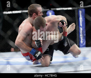 UFC fighter Paul Kelly, right, fights Jacob Volkmann at UFC-Live: Jones ...