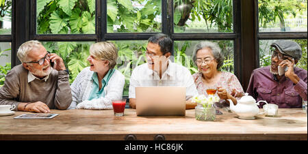 Senior Group Using Digital Device Relax Concept Stock Photo - Alamy