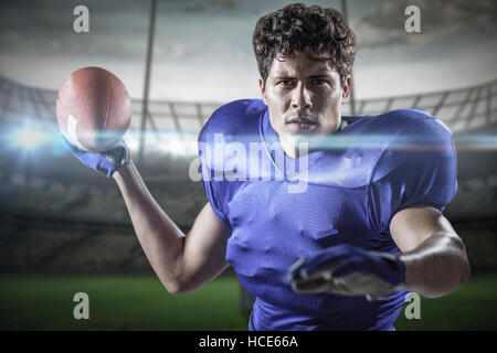 Composite image of portrait of sportsman throwing american football ...