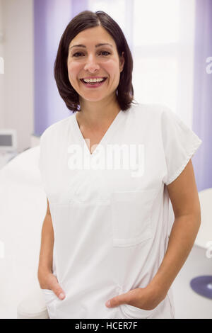 Woman dermatologist with dermatoscope in uniform and gloves in doctor ...
