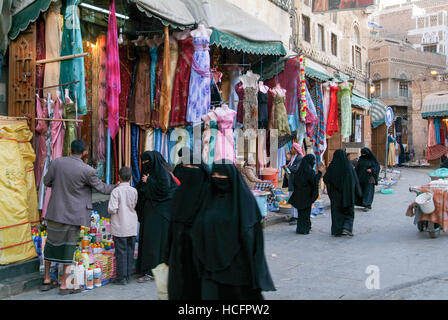 Oriental woman, wearing a black burqa, crowd of people, Piazza del ...