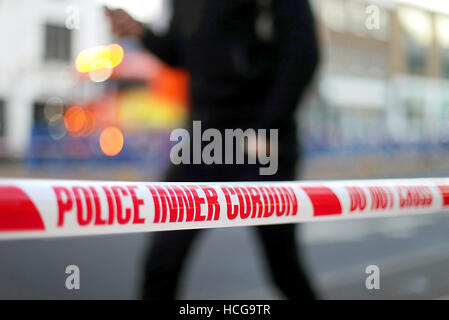 A police inner cordon tape on Upper Street in Islington, London Stock ...