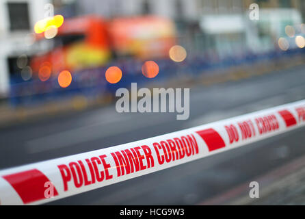 A police inner cordon tape on Upper Street in Islington, London Stock ...