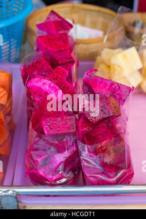 Colorful ripe dragon fruit and peeled lychees, tasty tropical exotic ...