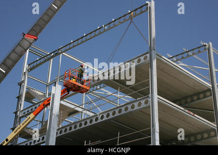 Construction site, PCC precast plank floor deck, structural steel frame ...