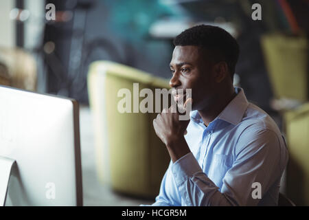 Businessman working over computer Stock Photo - Alamy