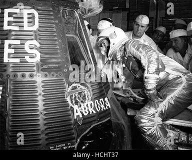 NASA Astronaut Scott Carpenter looks into his Mercury-Atlas 7 ...