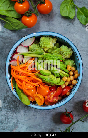 Colorful Buddha Bowl with chickpeas, carrots, tomatoes, cucumbers ...