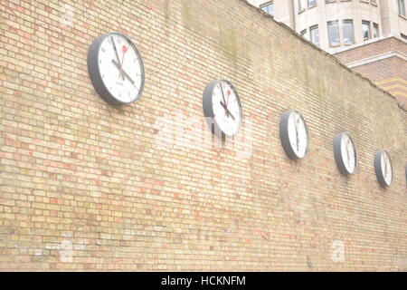 clocks on a wall with time zone of different country Stock Photo ...