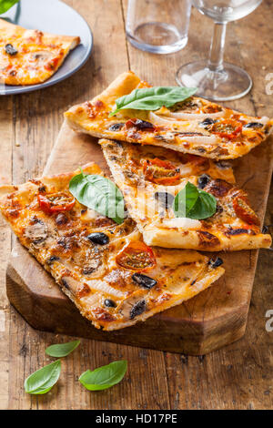 Fresh and hot pizza on the table Stock Photo - Alamy