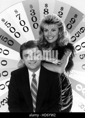 WHEEL OF FORTUNE, (from left): host Chuck Woolery, co-host Susan ...