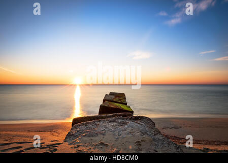 Beautiful red sunset over the ocean or sea Stock Photo - Alamy
