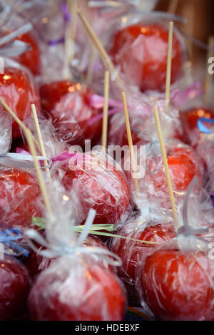 Bright red candy apples Stock Photo - Alamy