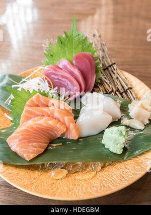 Japanese cuisine Sashimi with raw scallop Stock Photo - Alamy