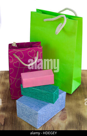 Colourful and bright shopping packages and boxes for gifts and presents ...