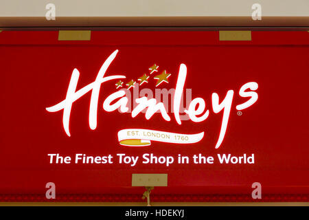 Hamleys toy shop store brand logo on window blinds winter dusk busy ...