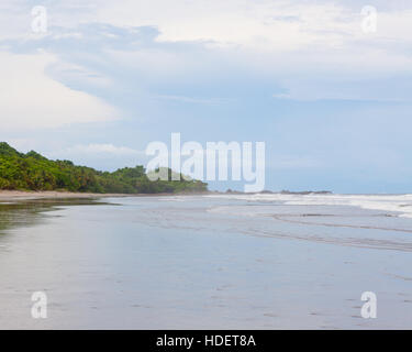 Big open sand beach montezuma Stock Photo - Alamy