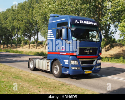 This image showcases a large truck designed for transporting heavy ...